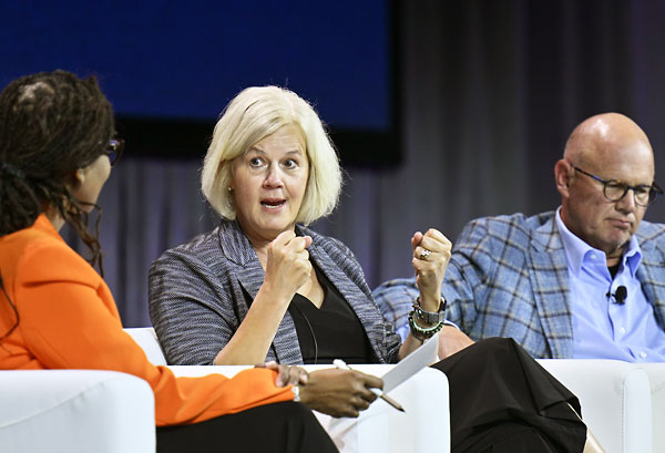 Patrice Harris, M.D., M.A. (left), and Stephen Loyd, M.D., engage in ...